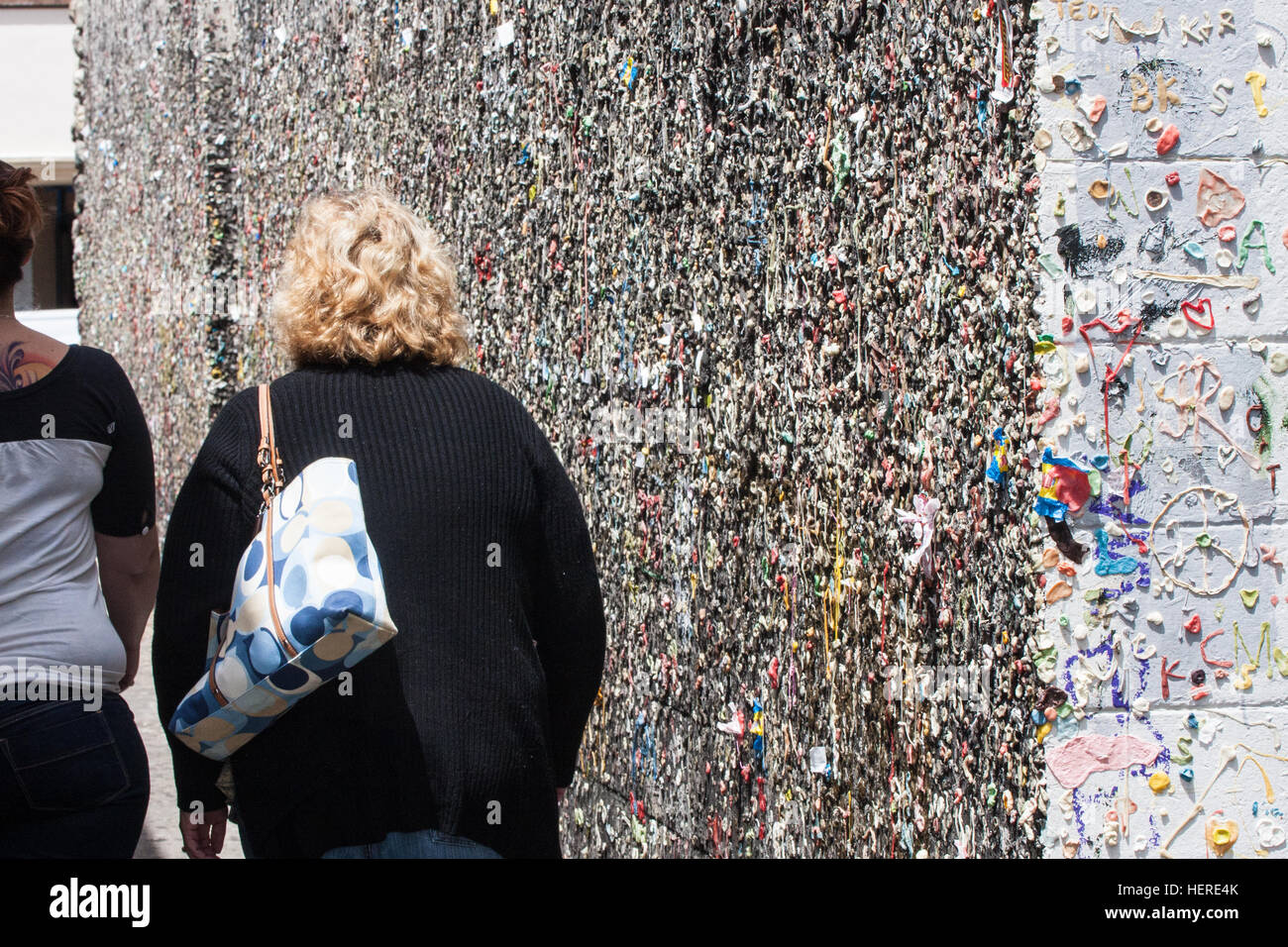 narrow path wall covered in chewing gum, Bubblegum Alley, a student ...