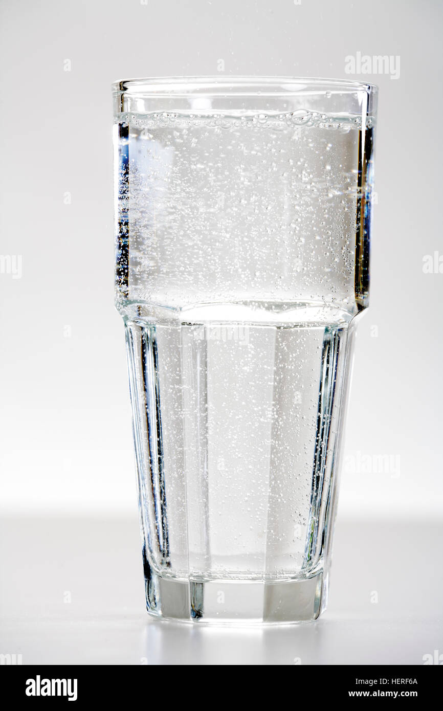 Glass of sparkling mineral water Stock Photo - Alamy