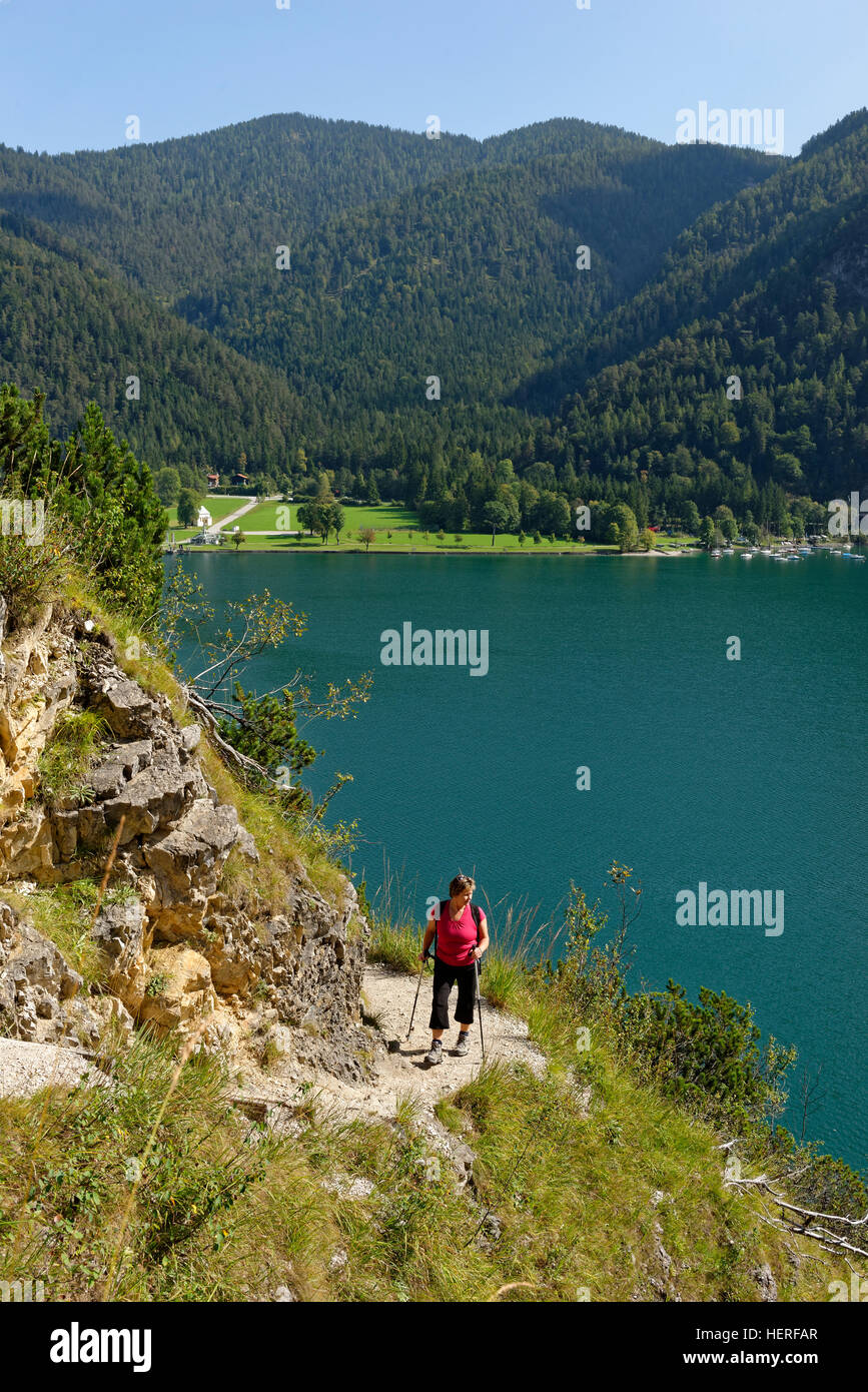 Woman hiker on Mariensteig trail, Achen Lake, Tyrol, Austria Stock ...