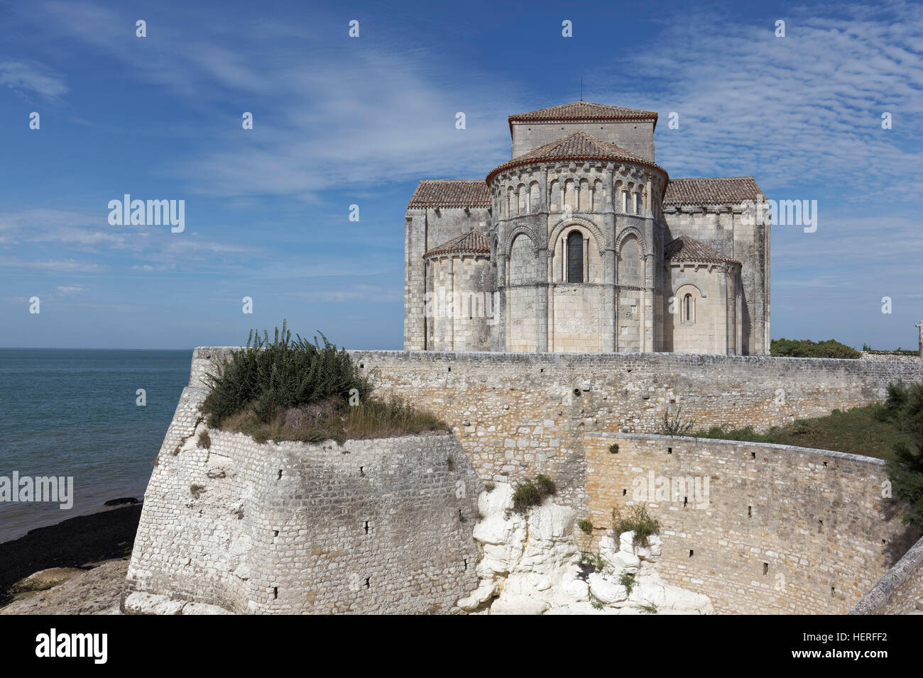 Romanesque church Sainte-Radegonde, Ste-Radegonde on a rocky cliff ...