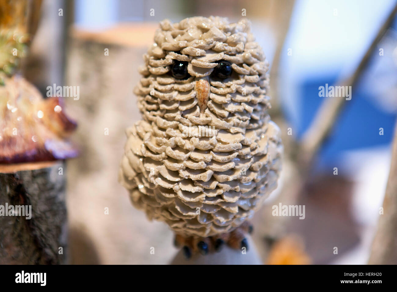 stone owl sculpture on stand Stock Photo - Alamy