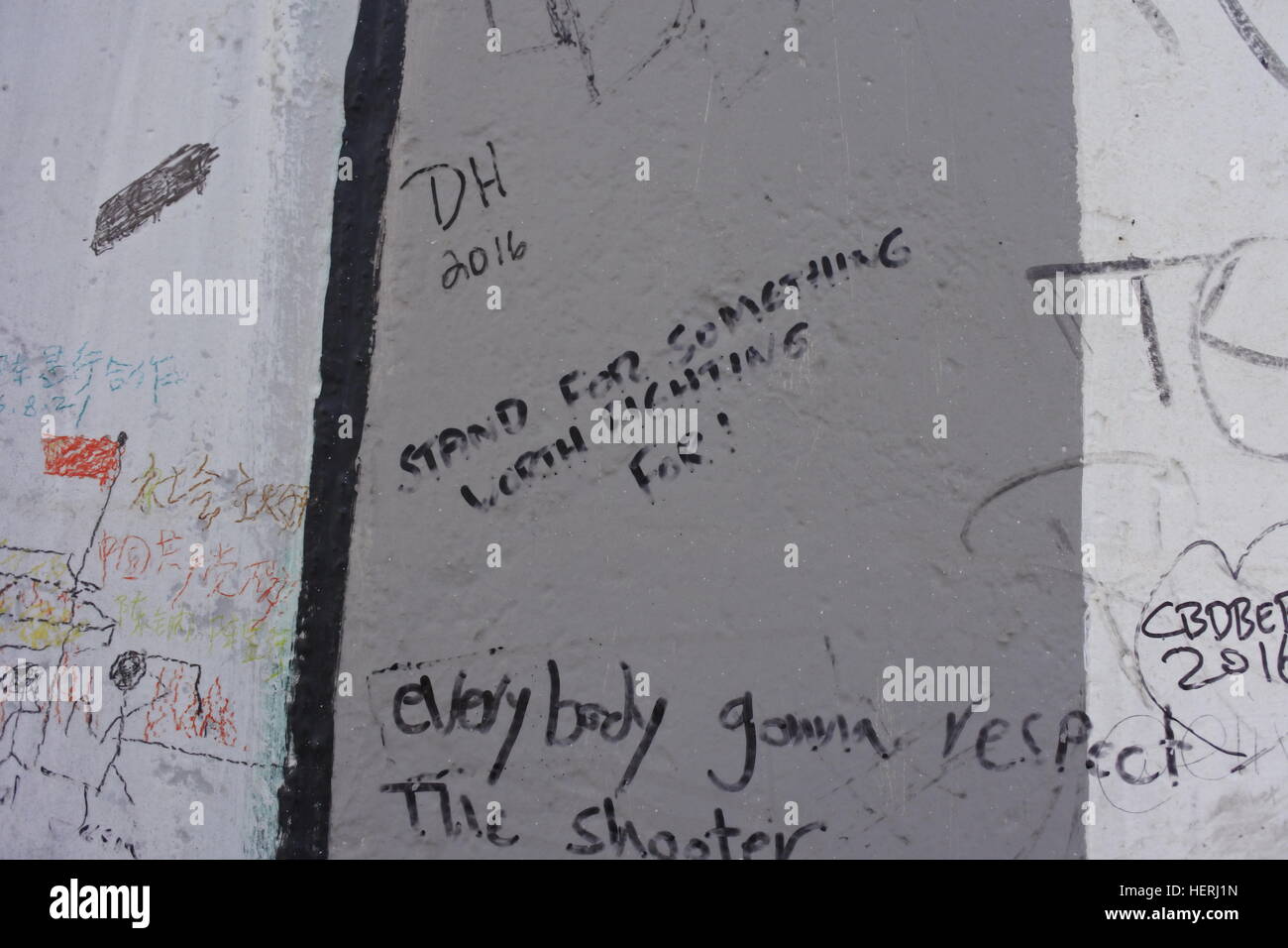 art writing on berlin wall germany east side gallery Stock Photo - Alamy