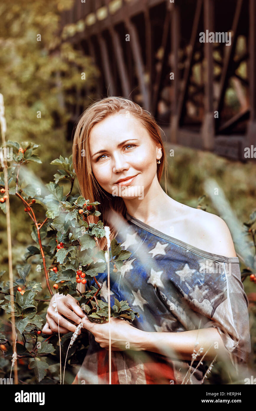 Beautiful girl in dress from the American flag Stock Photo - Alamy