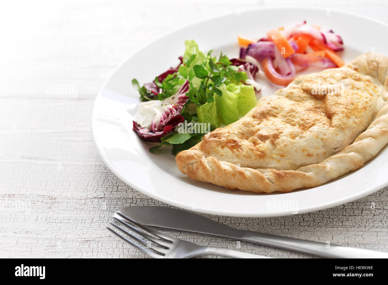 calzone, folded stuffed pizza, italian food Stock Photo - Alamy