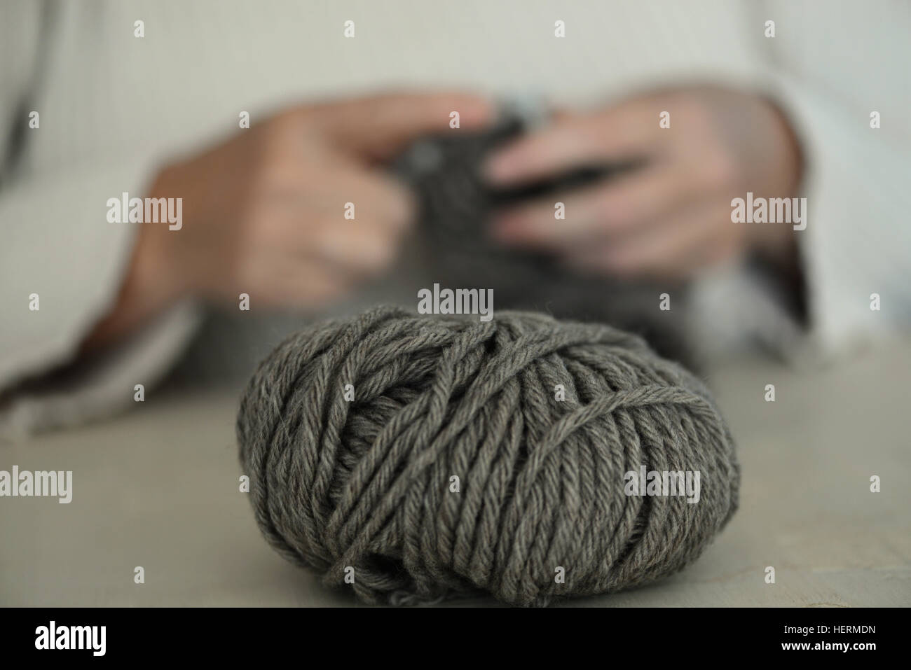 Woman knitting hi-res stock photography and images - Alamy