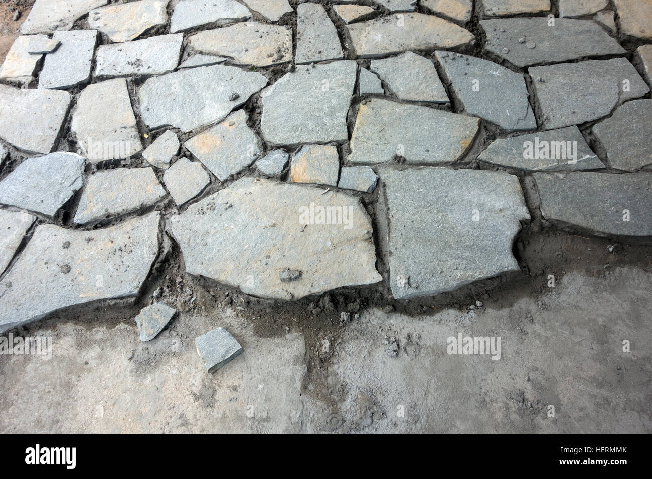 Building slate patio floor from gray shales Stock Photo - Alamy