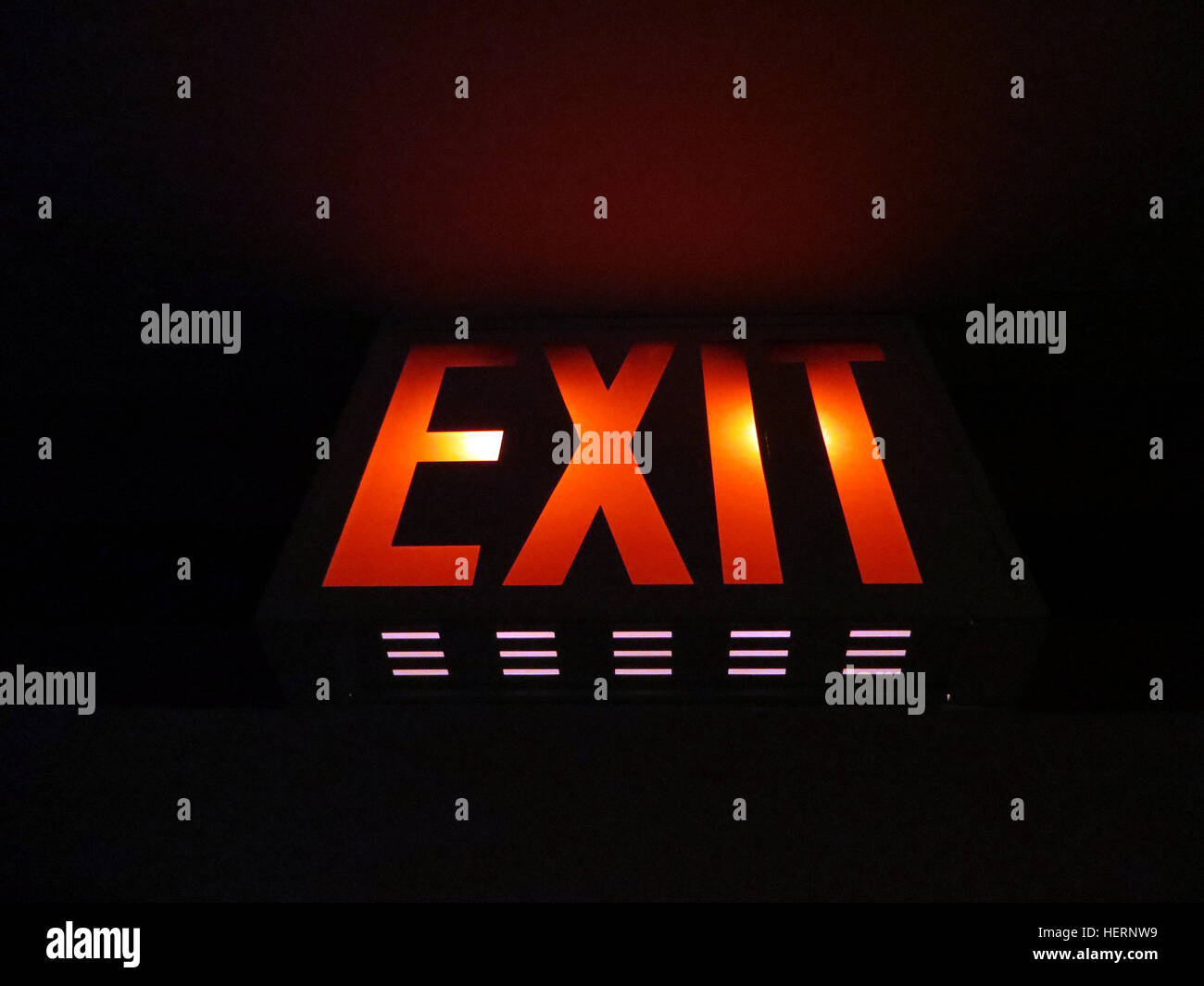 Illuminated exit sign Stock Photo - Alamy