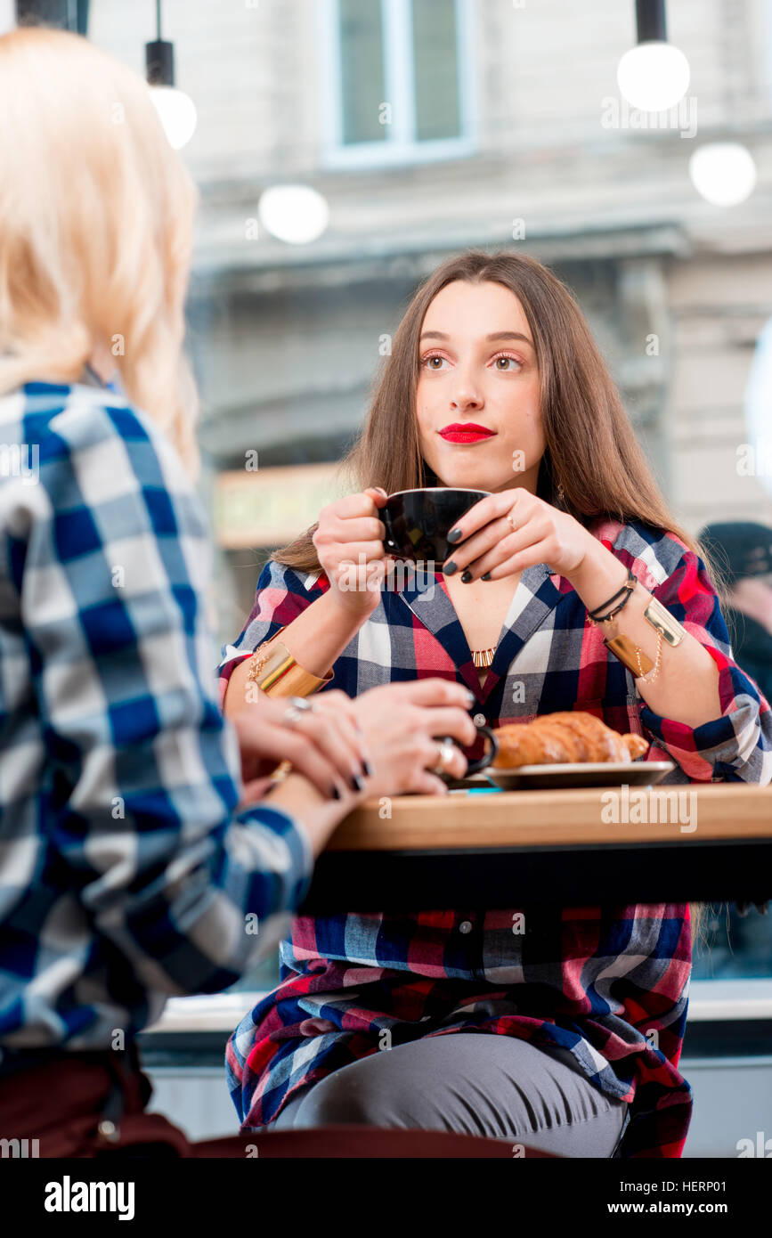 Friends at the cafe Stock Photo - Alamy