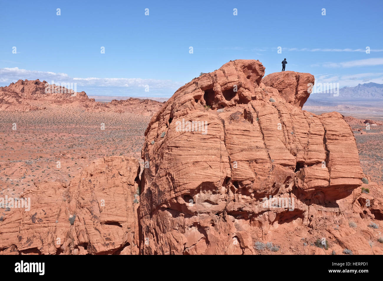 Man standing on rocks in desert landscape hi-res stock photography and ...