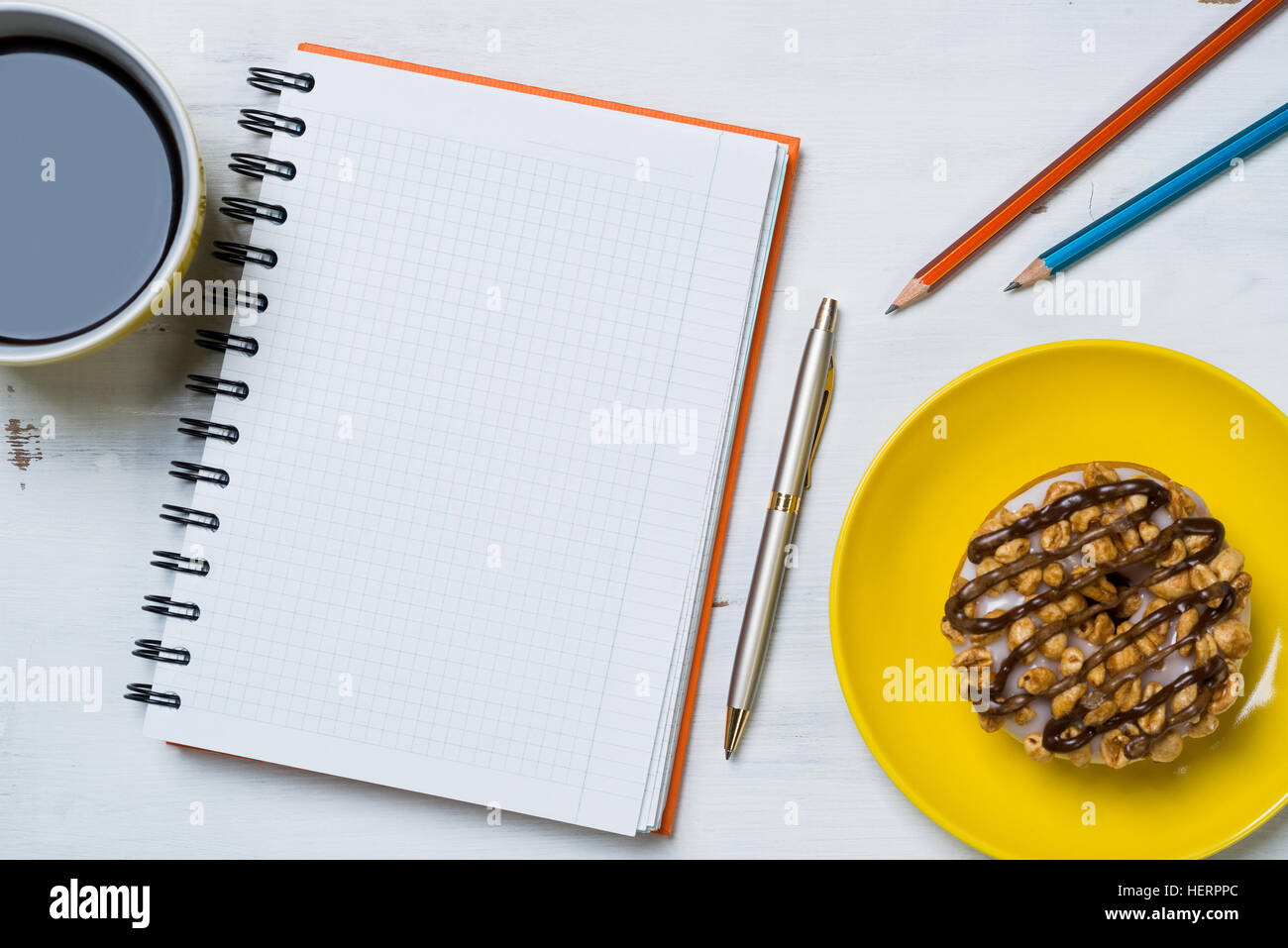 Coffee break with snack Stock Photo - Alamy