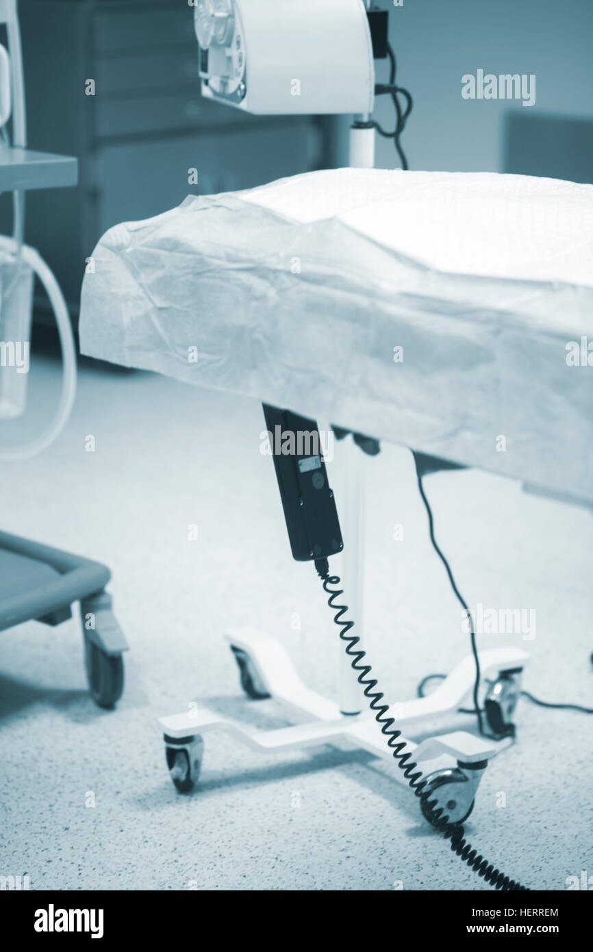 Hospital surgery bed in operating theater emergency room prepared for ...