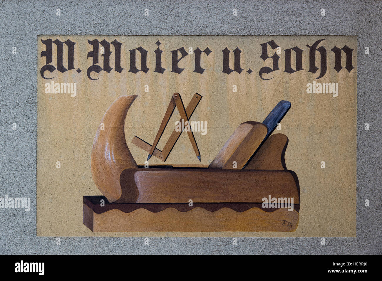 Sign for a carpenter showing a plane, square and compasses Stock Photo ...