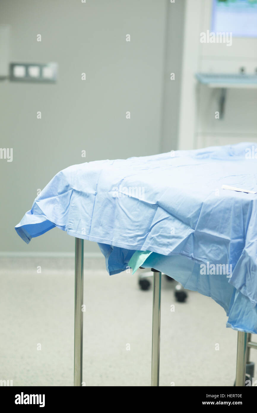 Hospital surgery bed in operating theater emergency room prepared for ...