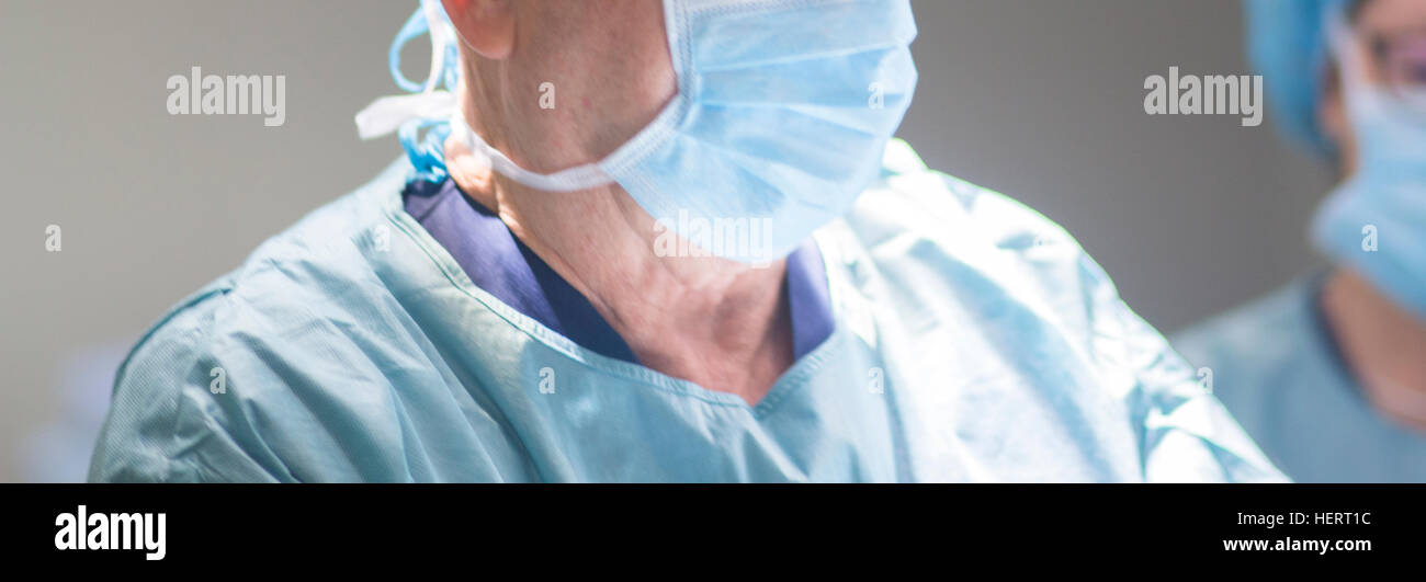 Surgeon in operating theater emergency room surgery in hospital clinic ...