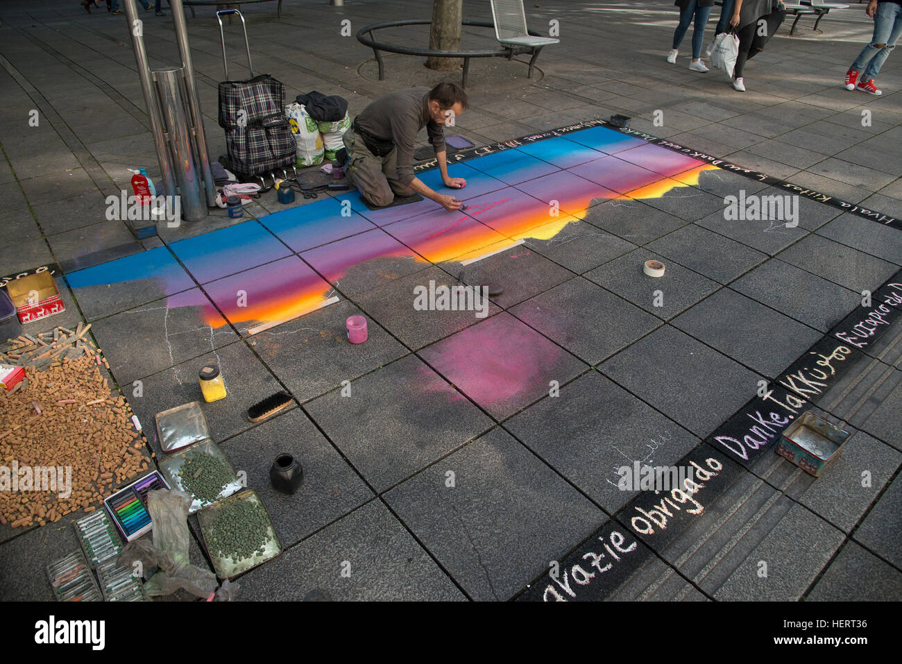 Artist drawing on pavement in hi-res stock photography and images - Alamy