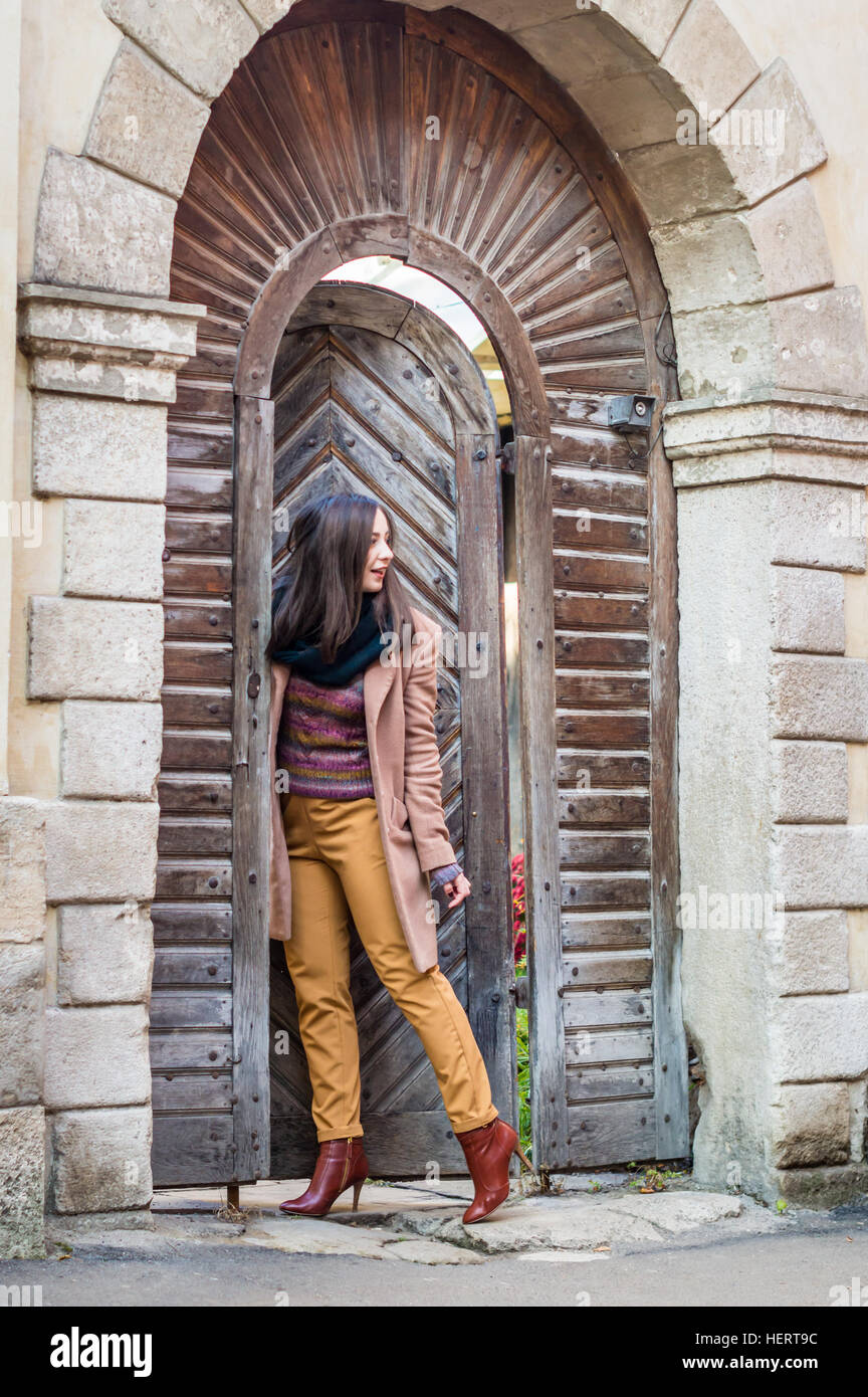 girl near old wooden gate Stock Photo - Alamy