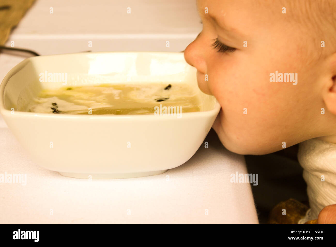 child eating bowl of soup Stock Photo - Alamy