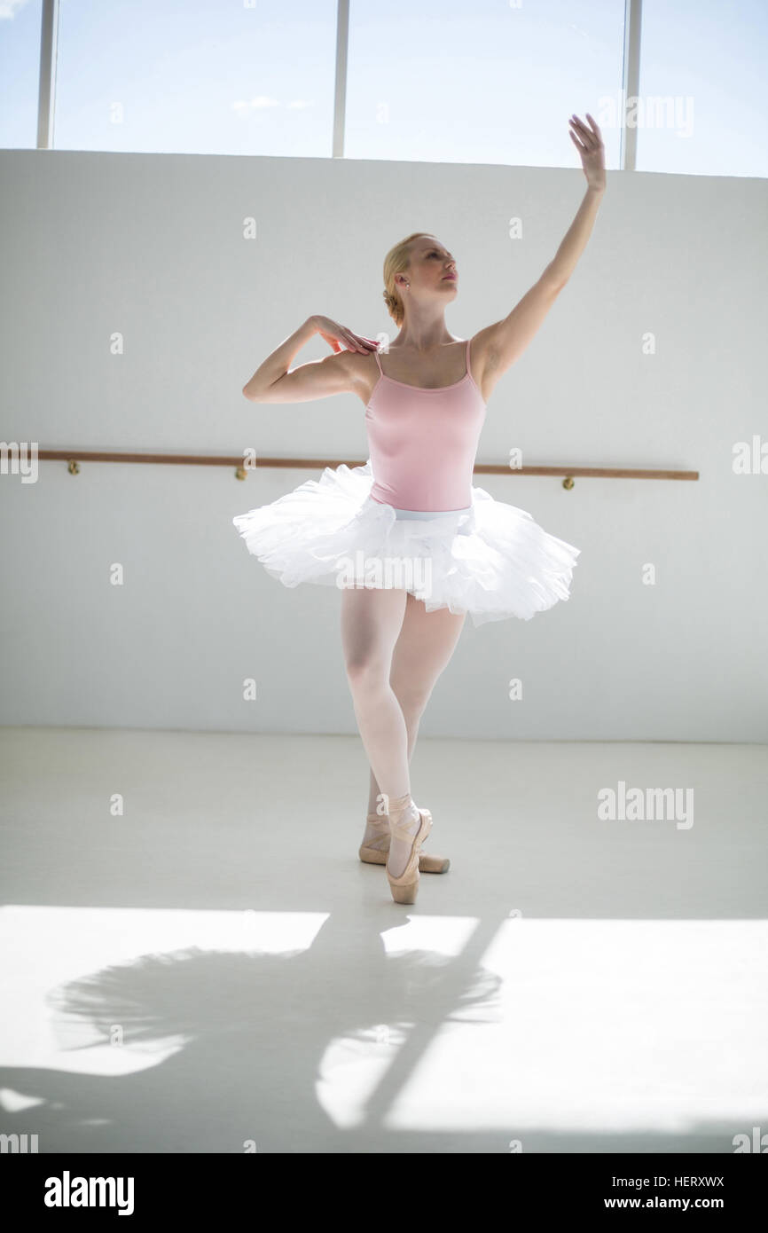 Ballerina practicing a ballet dance in ballet studio Stock Photo - Alamy