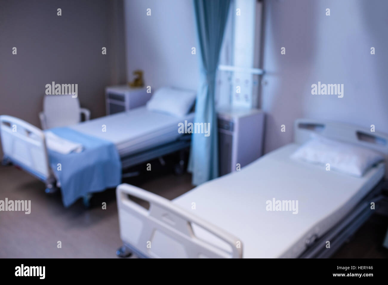 Blur view of empty hospital beds in ward of hospital Stock Photo - Alamy