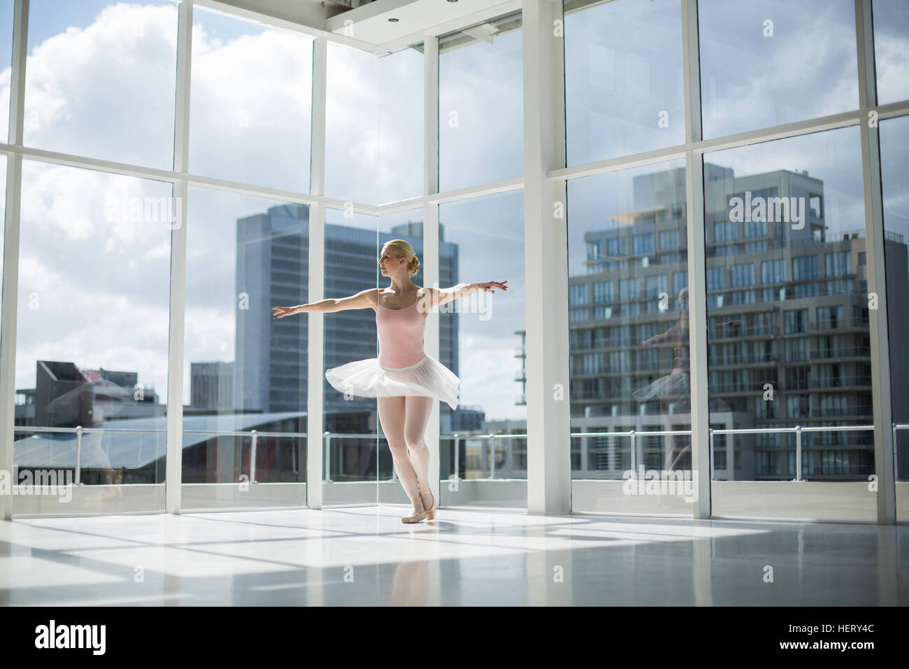 Ballerina practicing a ballet dance in ballet studio Stock Photo - Alamy
