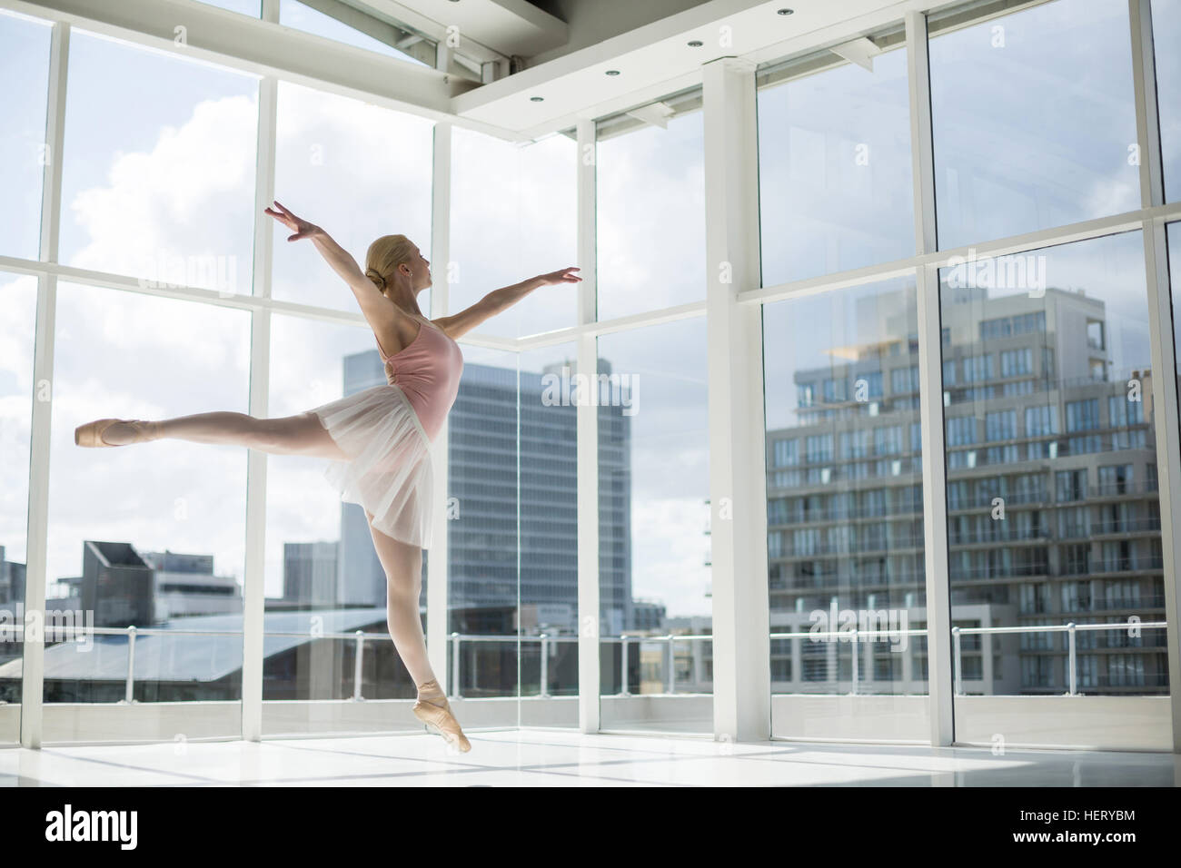 Ballerina practicing a ballet dance in ballet studio Stock Photo - Alamy