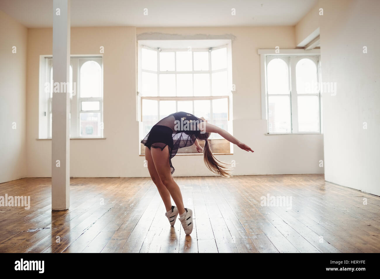 Young woman practising hip hop dance in studio Stock Photo - Alamy