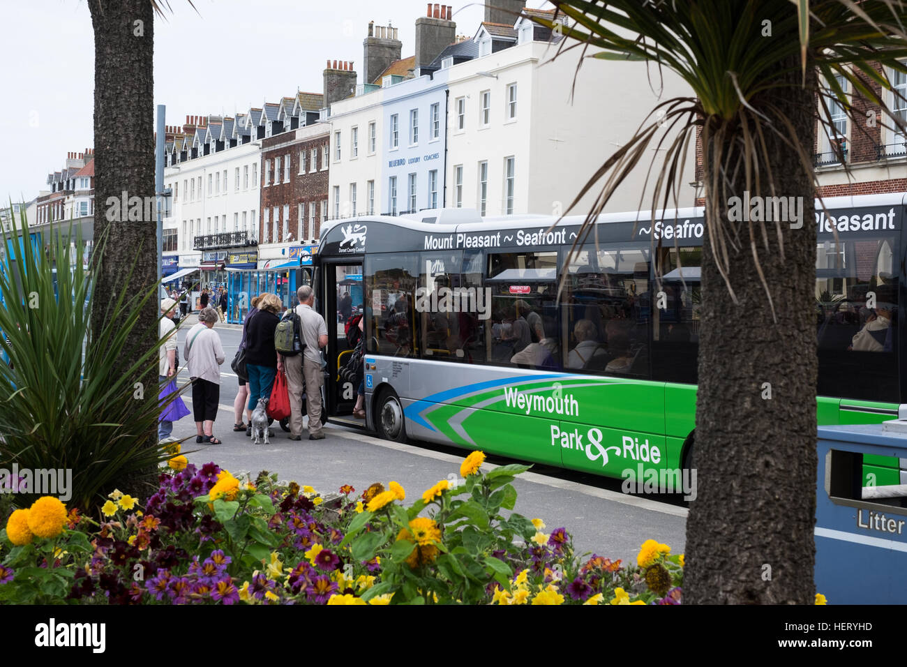 passengers boarding park and ride bus weymouth Stock Photo - Alamy