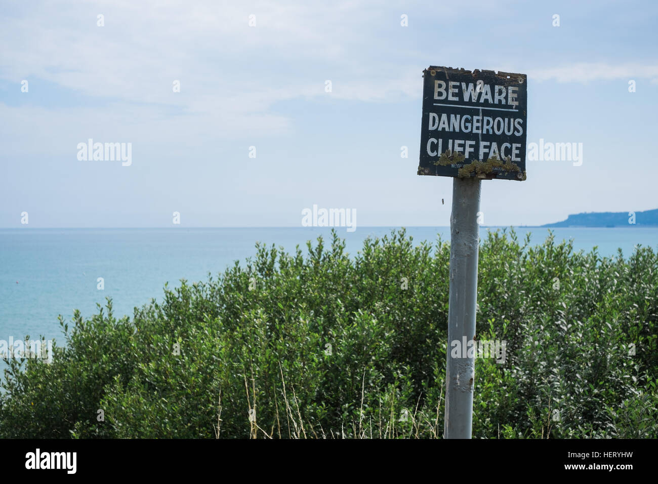 dangerous cliff sign Stock Photo - Alamy