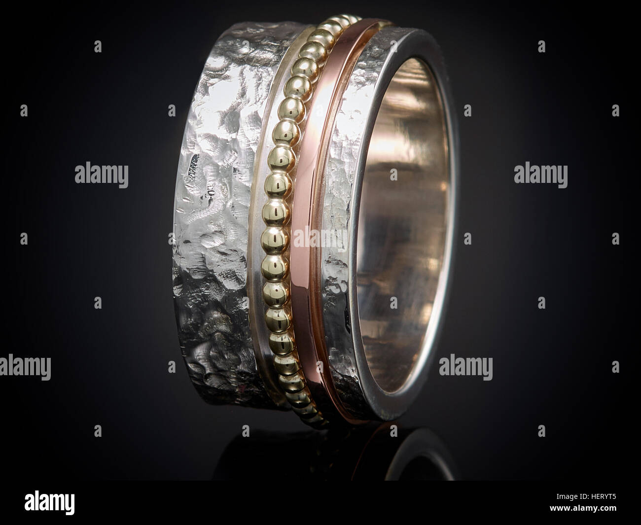 beautiful silver ring isolated on black background Stock Photo - Alamy