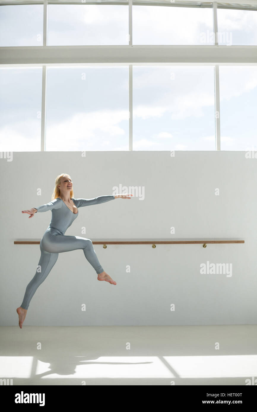 Ballerina practicing a ballet dance in ballet studio Stock Photo - Alamy