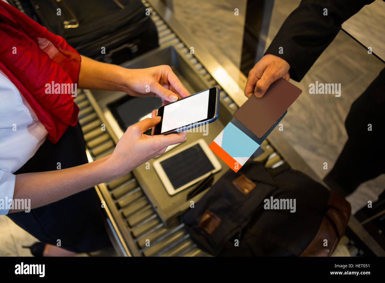 Close-up of female scanning the boarding pass with mobile phone Stock ...