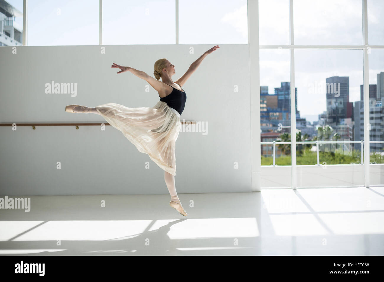 Ballerina practicing a ballet dance in ballet studio Stock Photo - Alamy