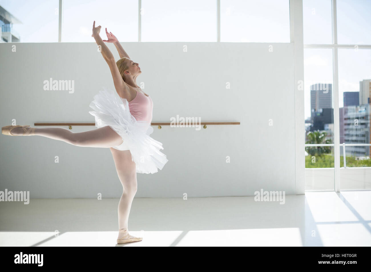 Ballerina practicing a ballet dance in ballet studio Stock Photo - Alamy