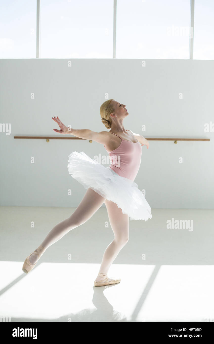 Ballerina practicing a ballet dance in ballet studio Stock Photo - Alamy