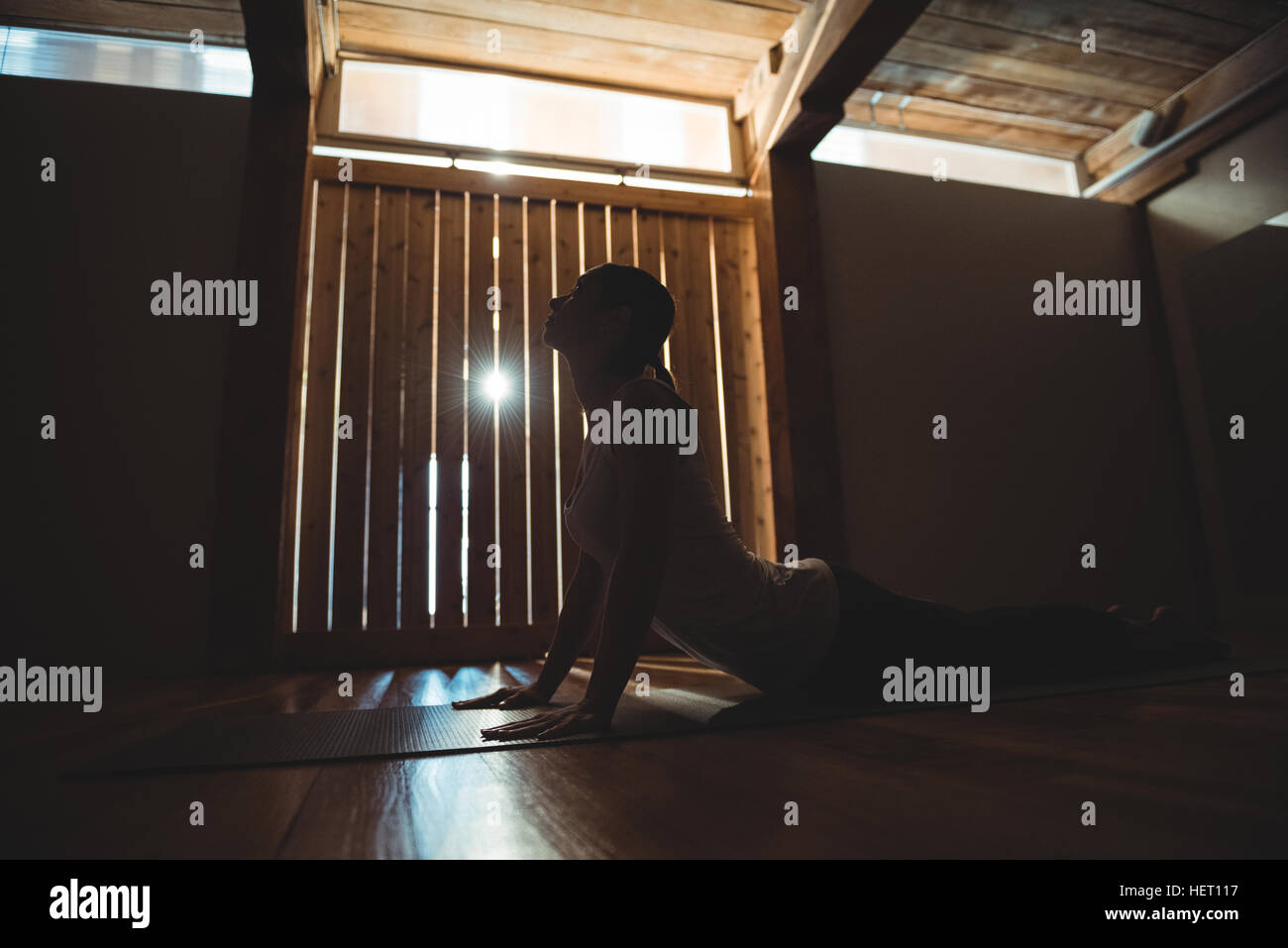 Woman practising cobra pose hi-res stock photography and images - Alamy