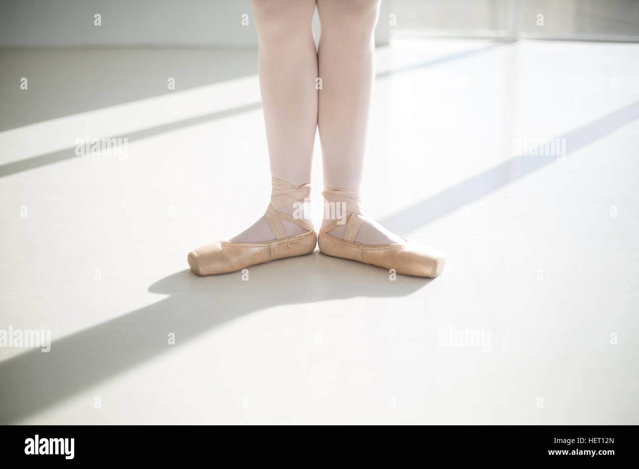 Low section of ballet dancers feet performing ballet dance in the ...