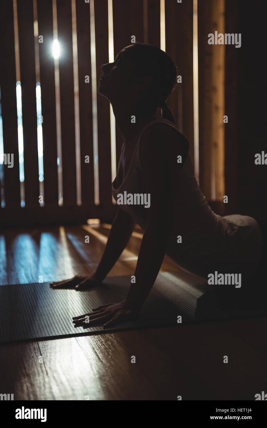 Woman practising cobra pose hi-res stock photography and images - Alamy