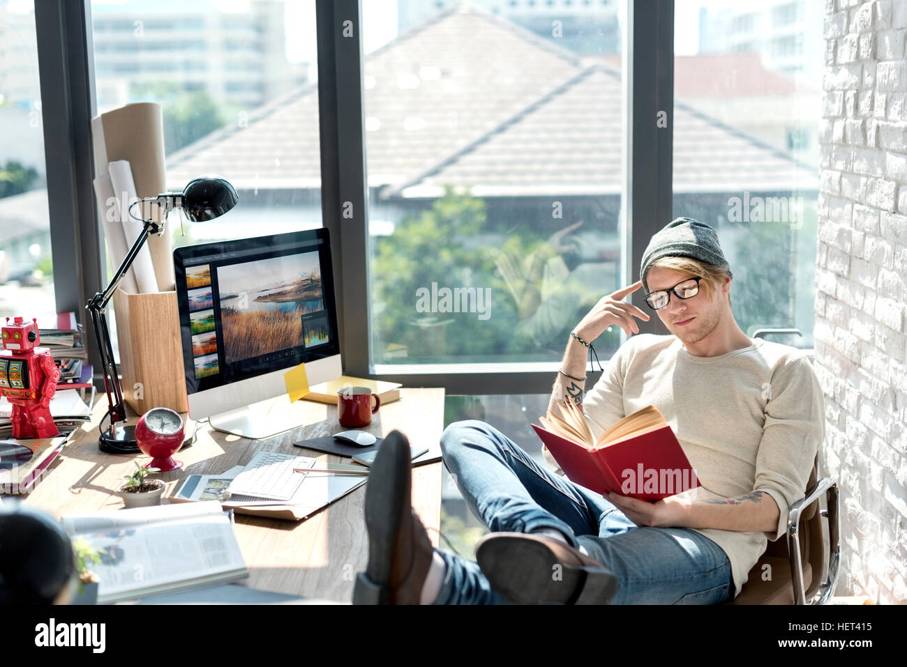 Man Reading Book Knowledge Relax Concept Stock Photo - Alamy