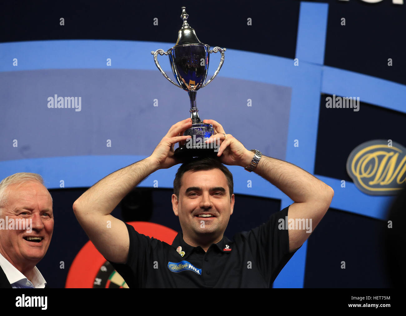 The winner of the parliamentary darts challenge final Gavin Newlands ...