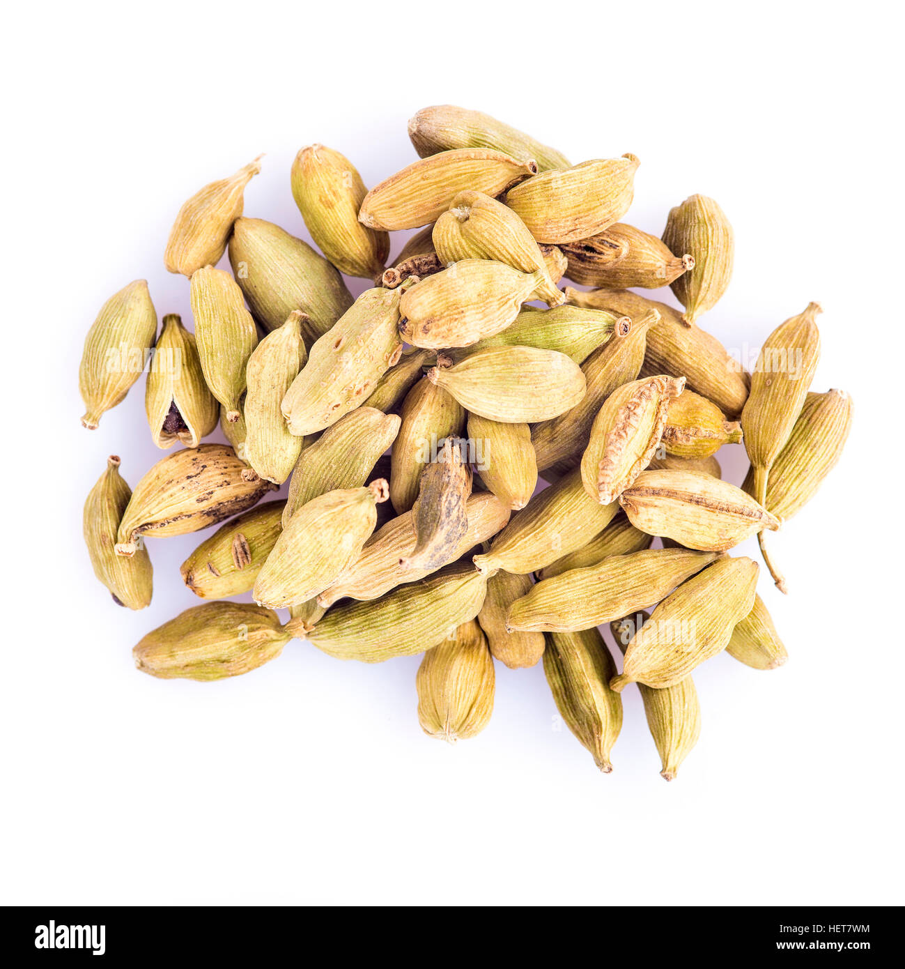 Green cardamom seeds isolated on a white background Stock Photo - Alamy