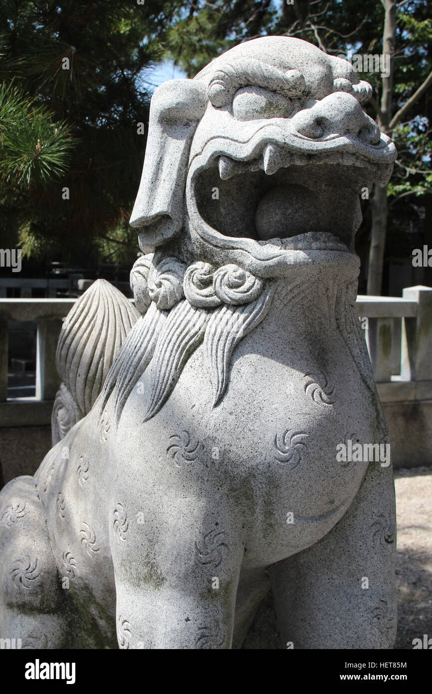 A statue of a lion (?) in a Shintoist temple (Mefu shrine) in Matsue ...