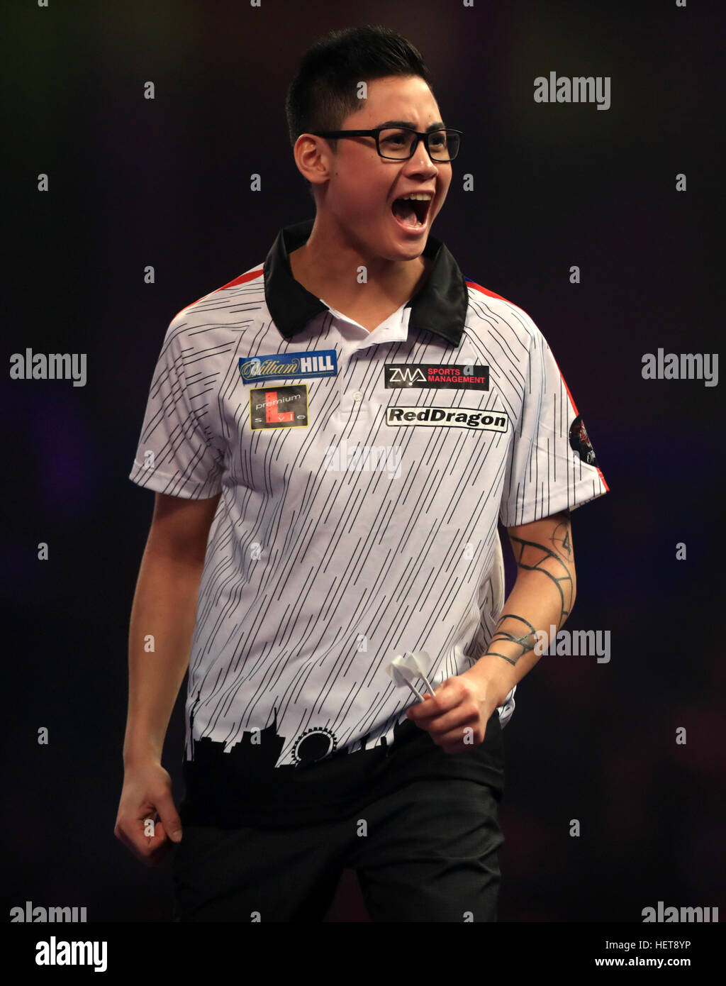 Rowby-John Rodriguez celebrates taking the first set against Dave ...