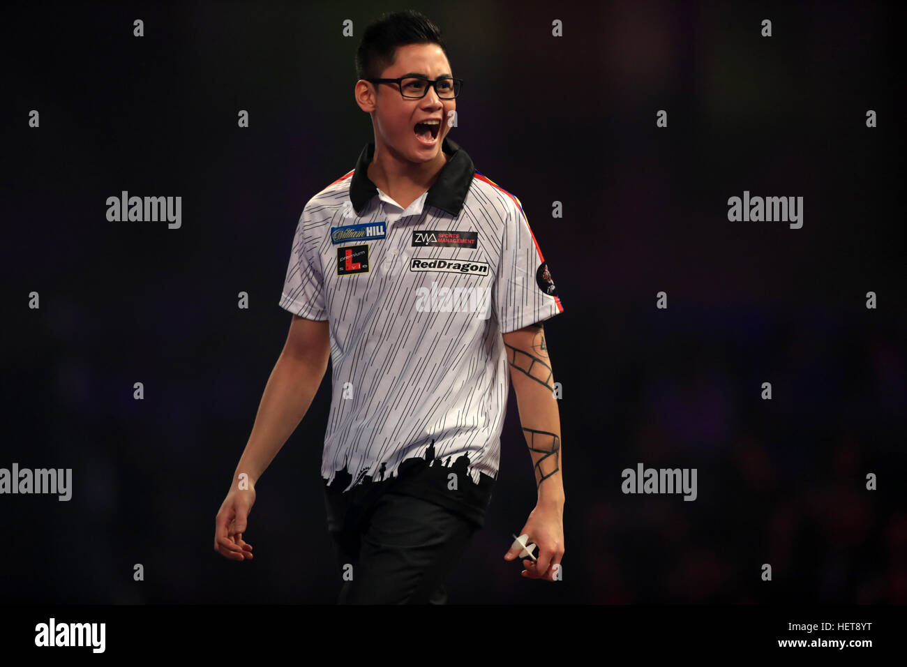 Rowby-John Rodriguez celebrates taking the first set against Dave ...