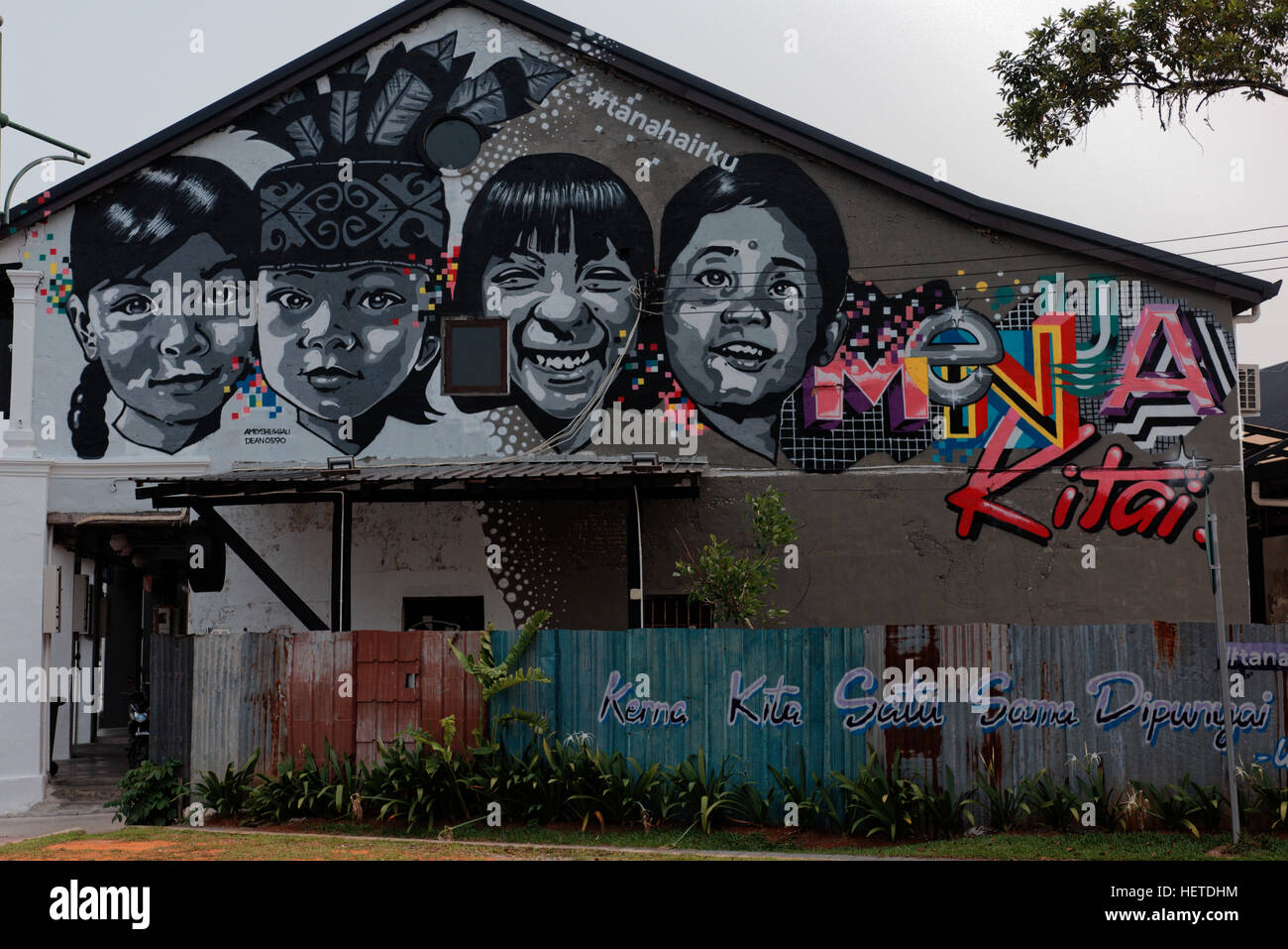 Murals depicting Sarawakian culture painted on a café in Kuching ...
