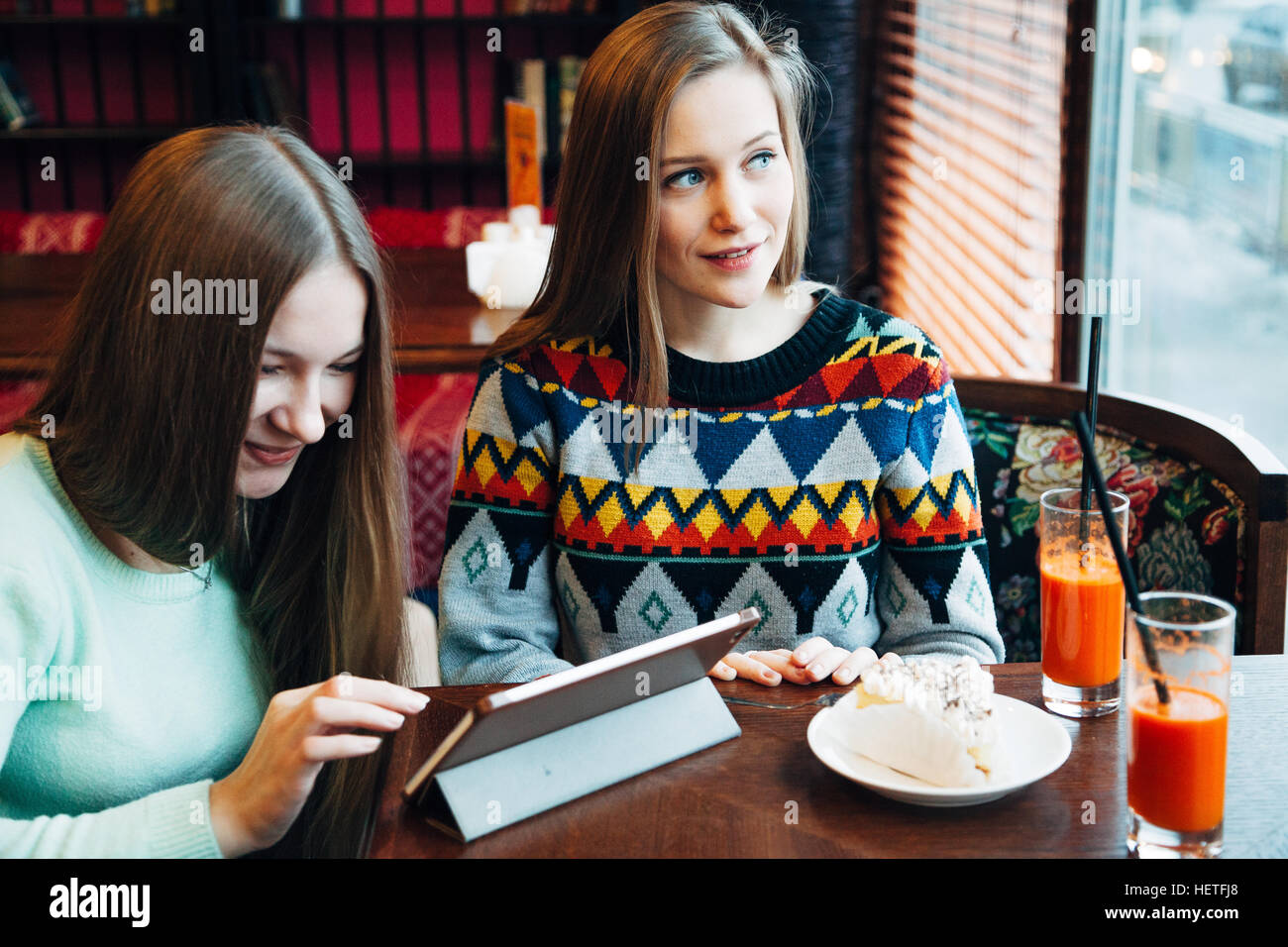 Selfie girls in cafe Stock Photo - Alamy