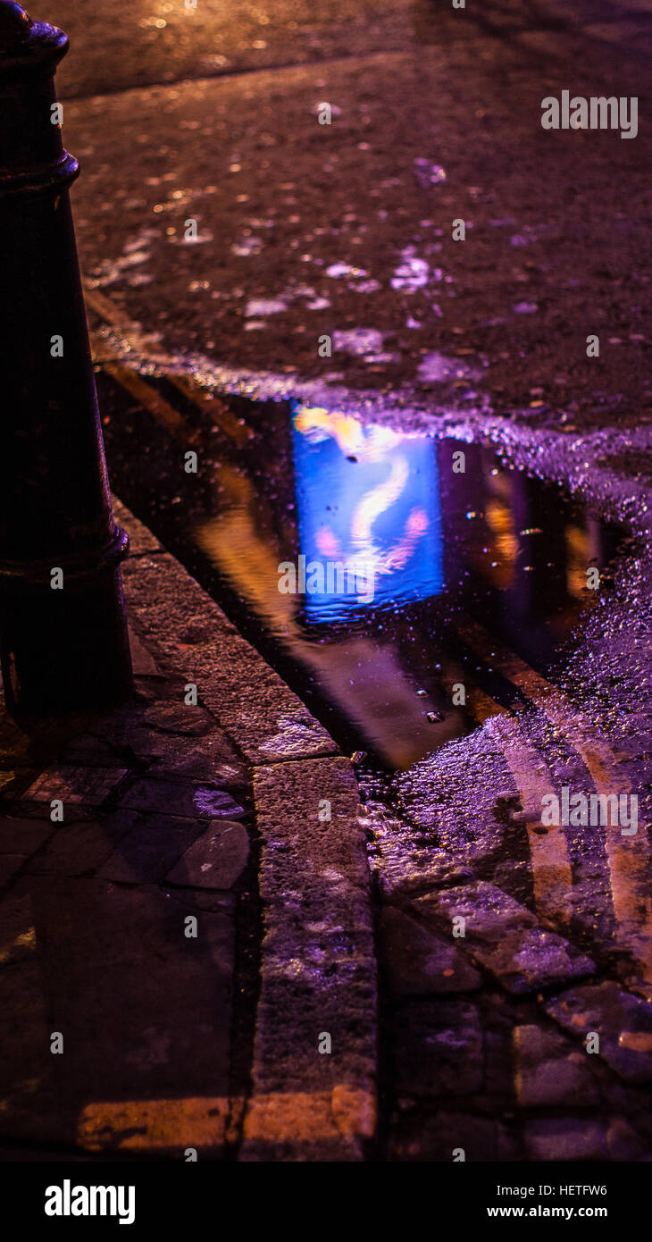 Reflection in a puddle of water Stock Photo - Alamy