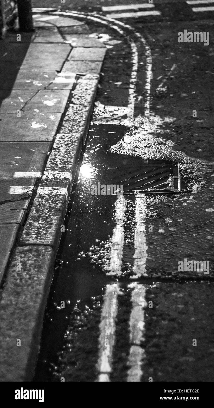 Puddle of water in black and white Stock Photo - Alamy