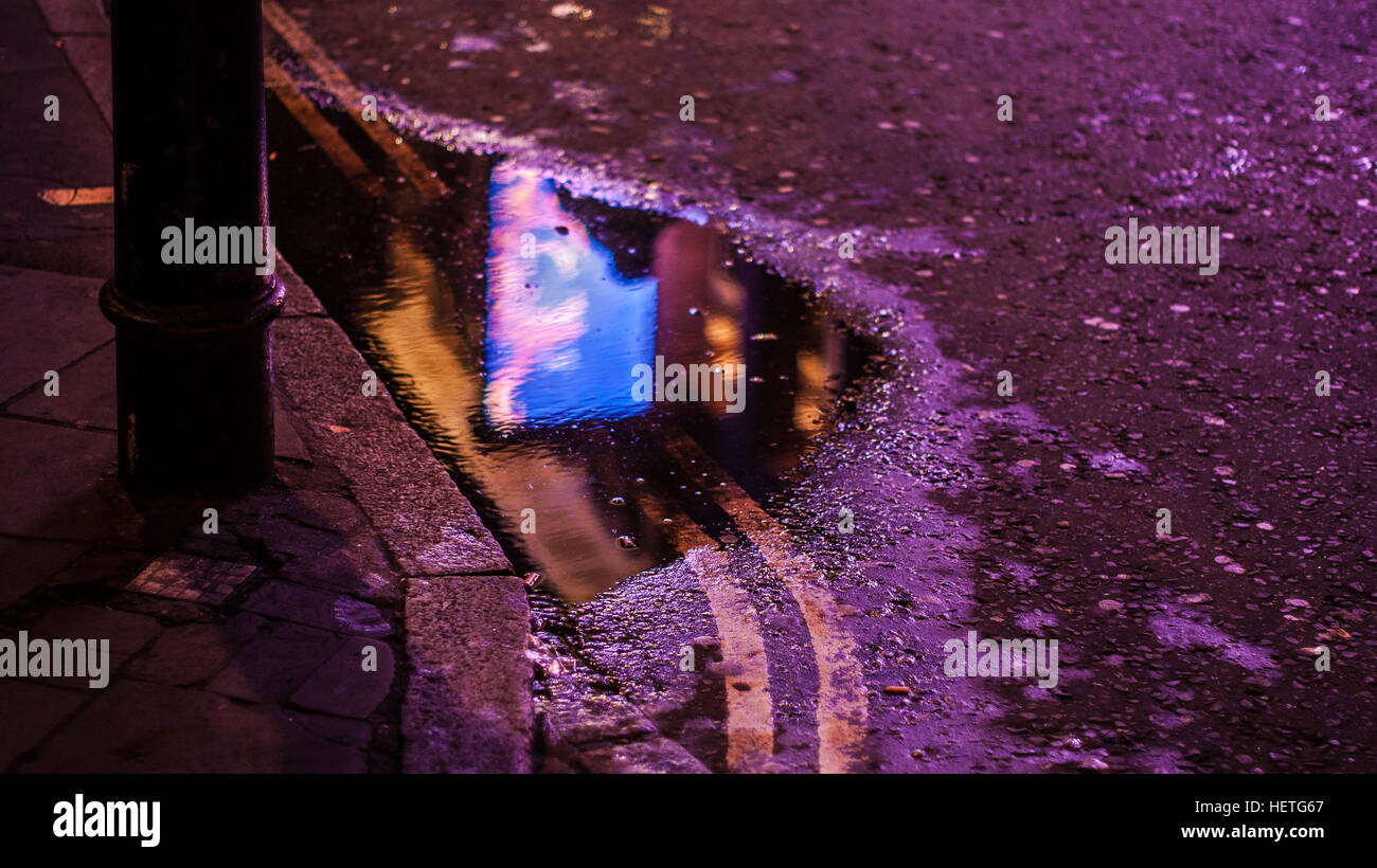 Reflection in a puddle of water Stock Photo - Alamy