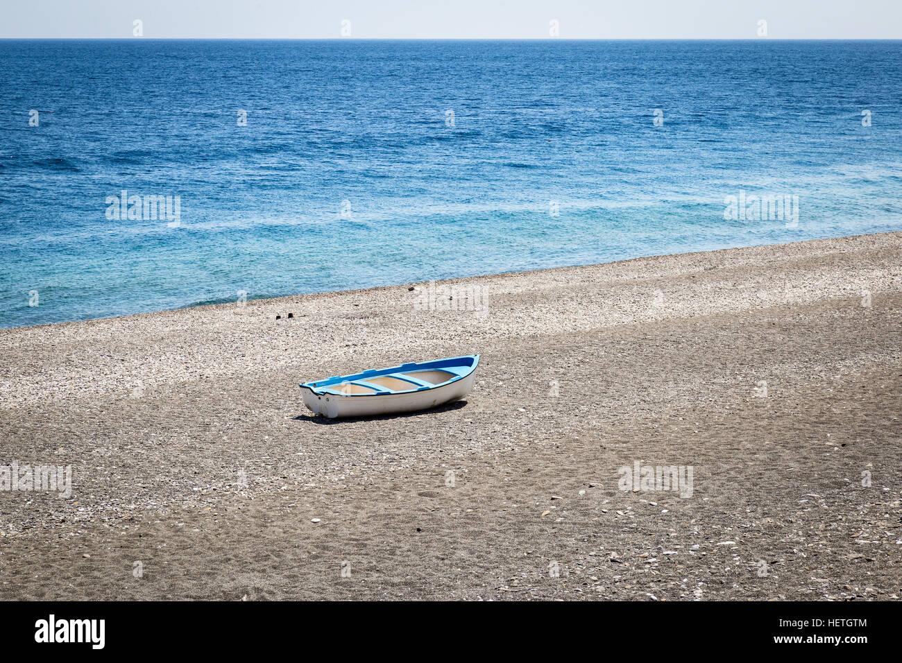 Rowboat on a Sicilian beach Stock Photo - Alamy