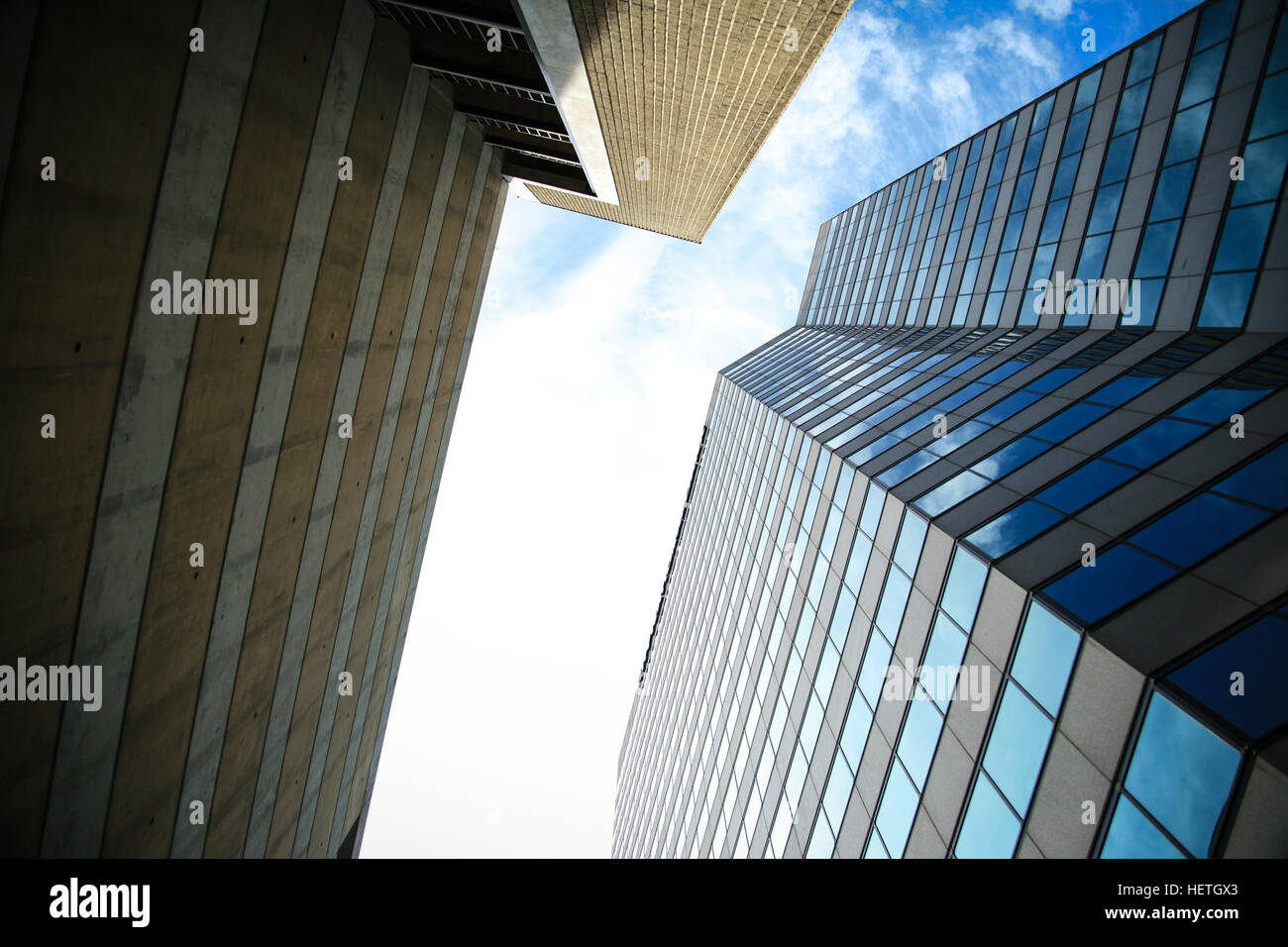 Looking up between buildings Stock Photo - Alamy